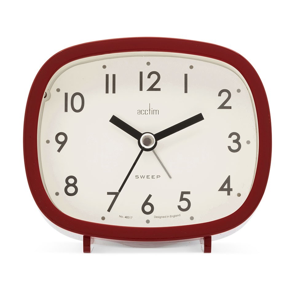 Red Alarm Clock In Hand Holding